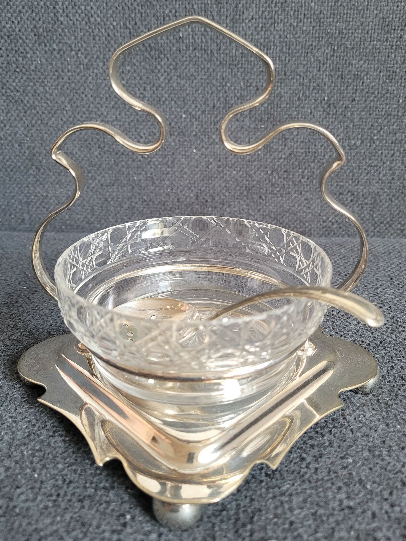 Antique silver-plated English sugar bowl with a round glass insert